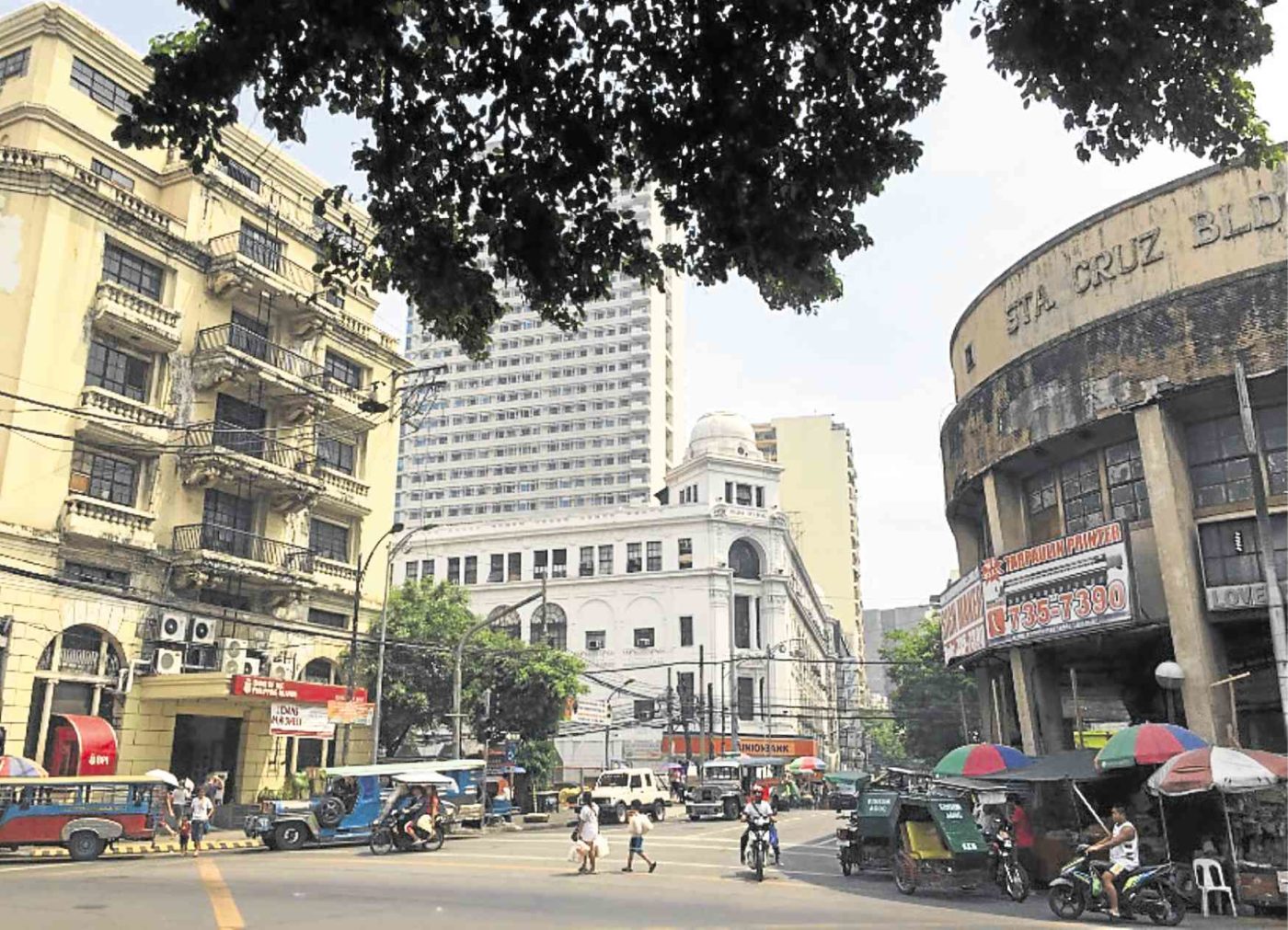 NHCP stops Erap’s demolition of postwar Santa Cruz Building in Escolta ...